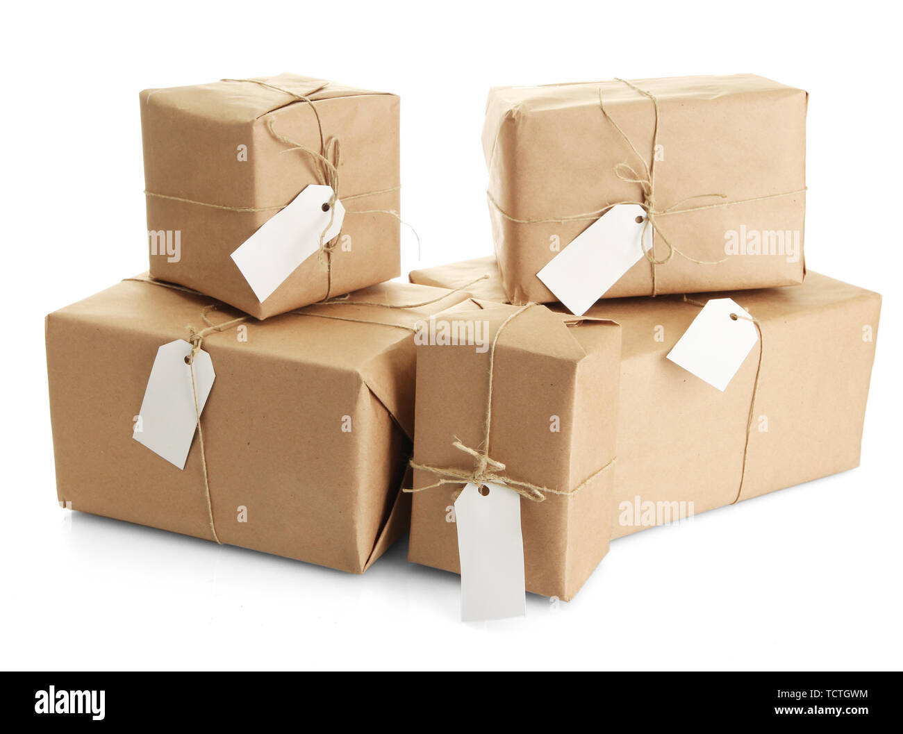 parcels boxes with kraft paper, isolated on white Stock Photo - Alamy