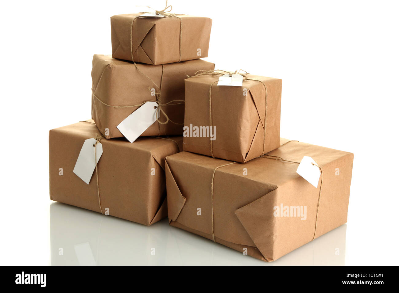 Pile of parcels wrapped up with string hi-res stock photography and ...