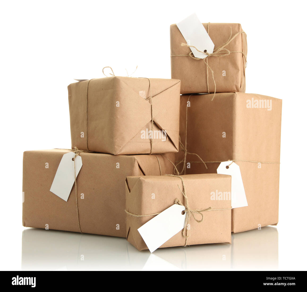 parcels boxes with kraft paper, isolated on white Stock Photo - Alamy