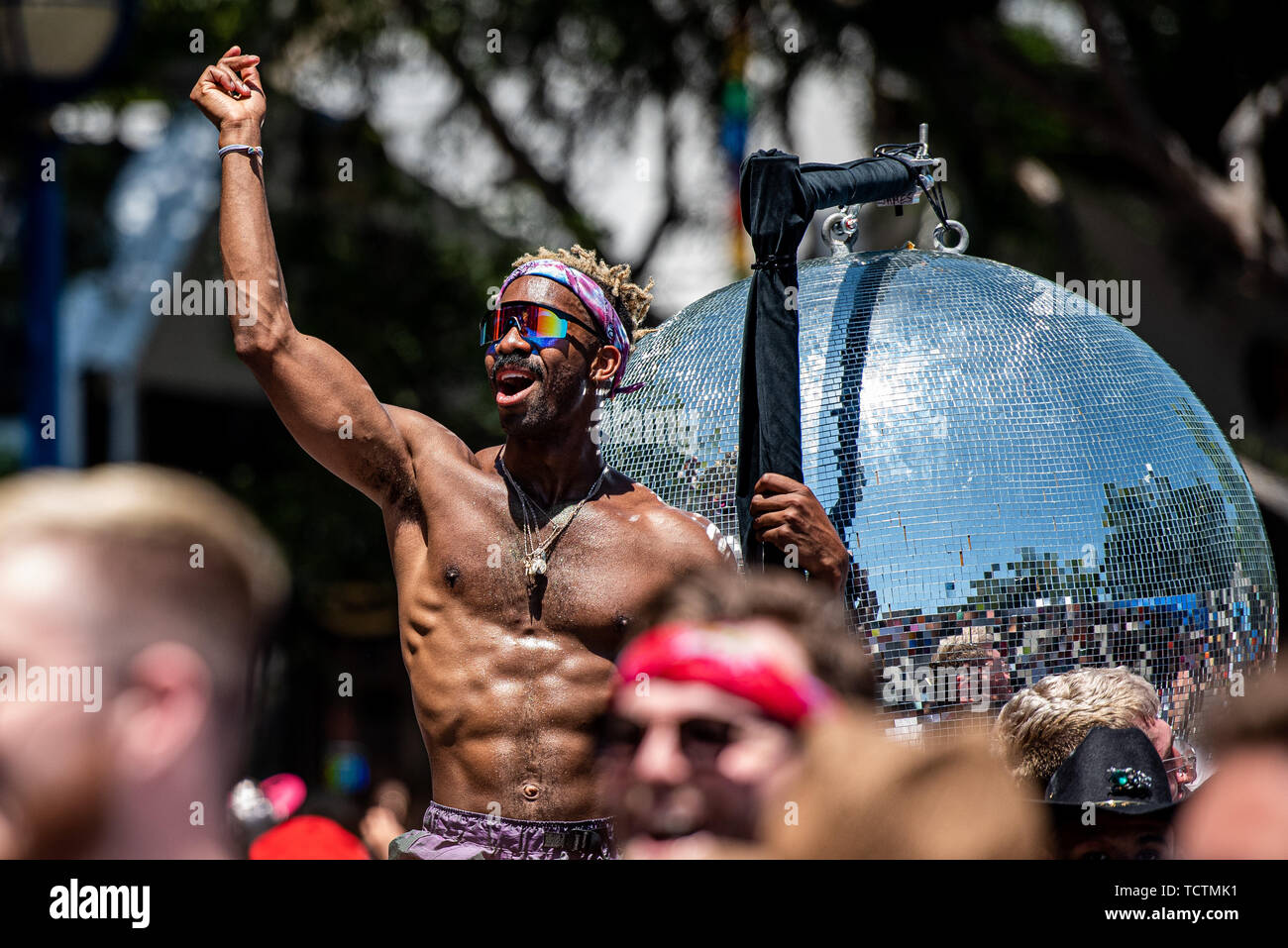 West Hollywood, California, USA. 9th June, 2019. A man rides a float in ...