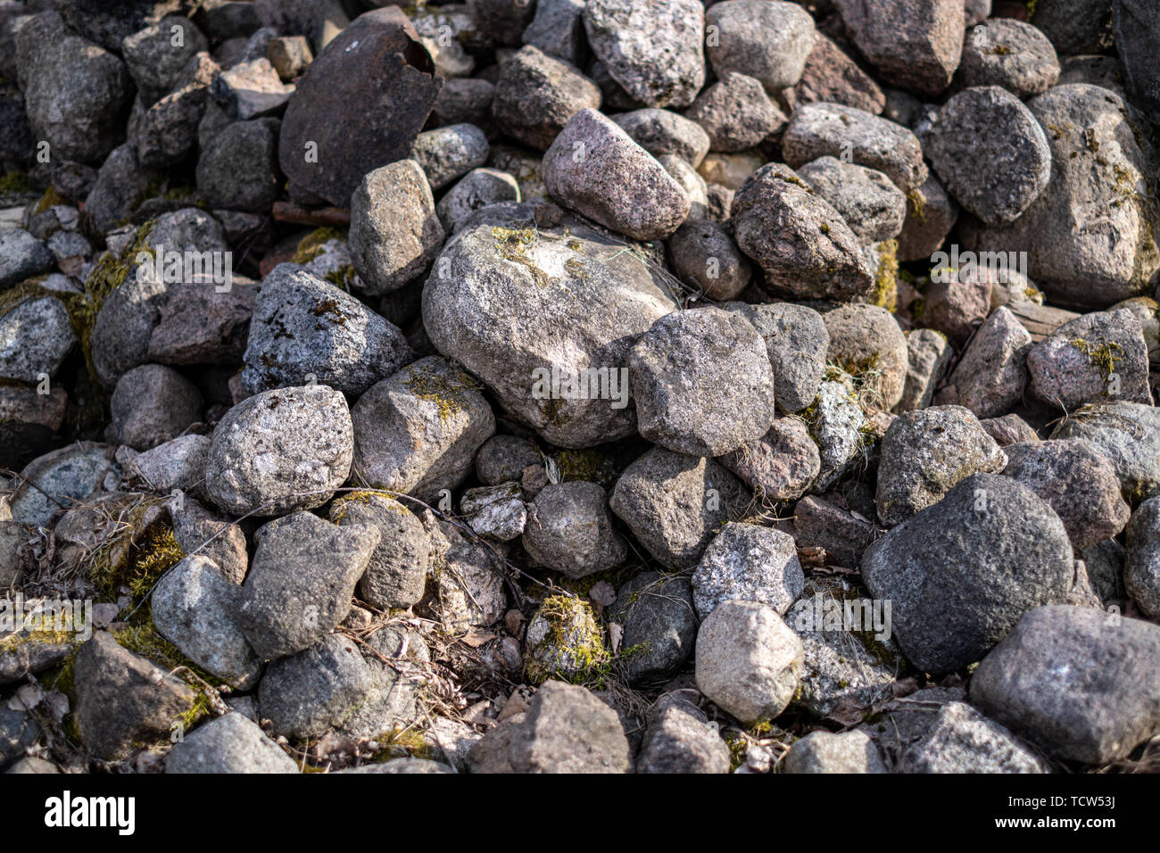 large rock in sand in countryside, isolated stone Stock Photo - Alamy
