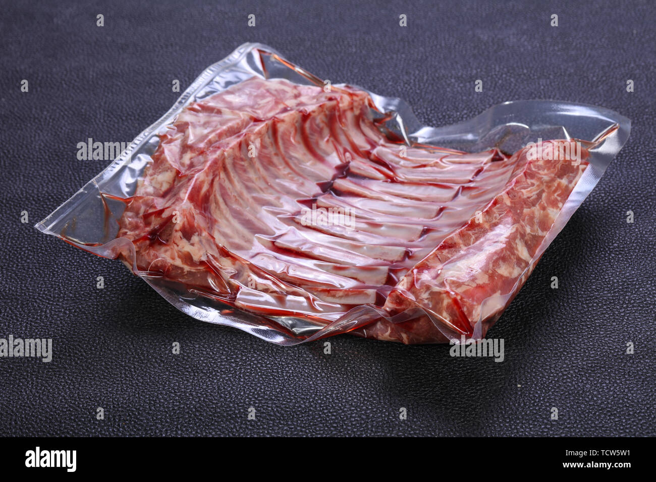 Raw rack of lamb in the pack Stock Photo - Alamy