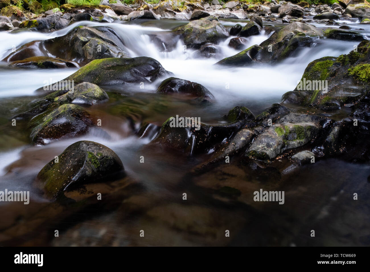 Shallow water over pebbles hi-res stock photography and images - Alamy
