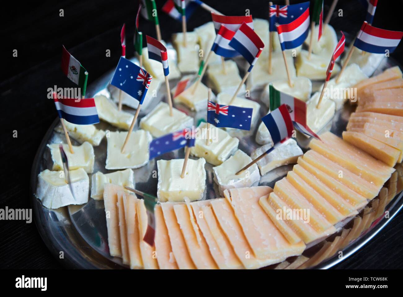 Cheese cubes with flags. Yellow Edam cheese blocks with flags Stock ...