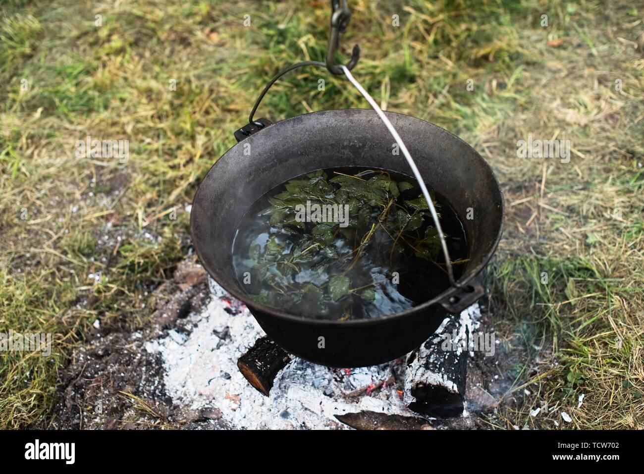 Boiling water on campfire hi-res stock photography and images - Alamy