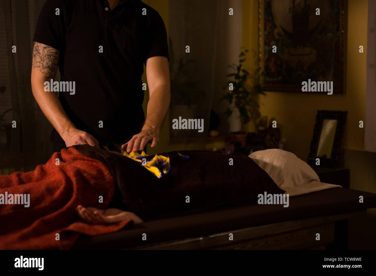 Chinese fire massage and therapy Stock Photo - Alamy