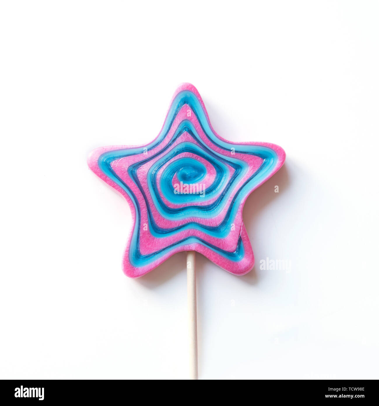 Lollipops swirl candy shaped as star on white background. Top view ...