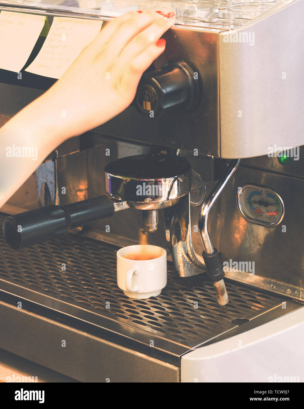 Cappuccino pouring from coffee machine hi-res stock photography and ...