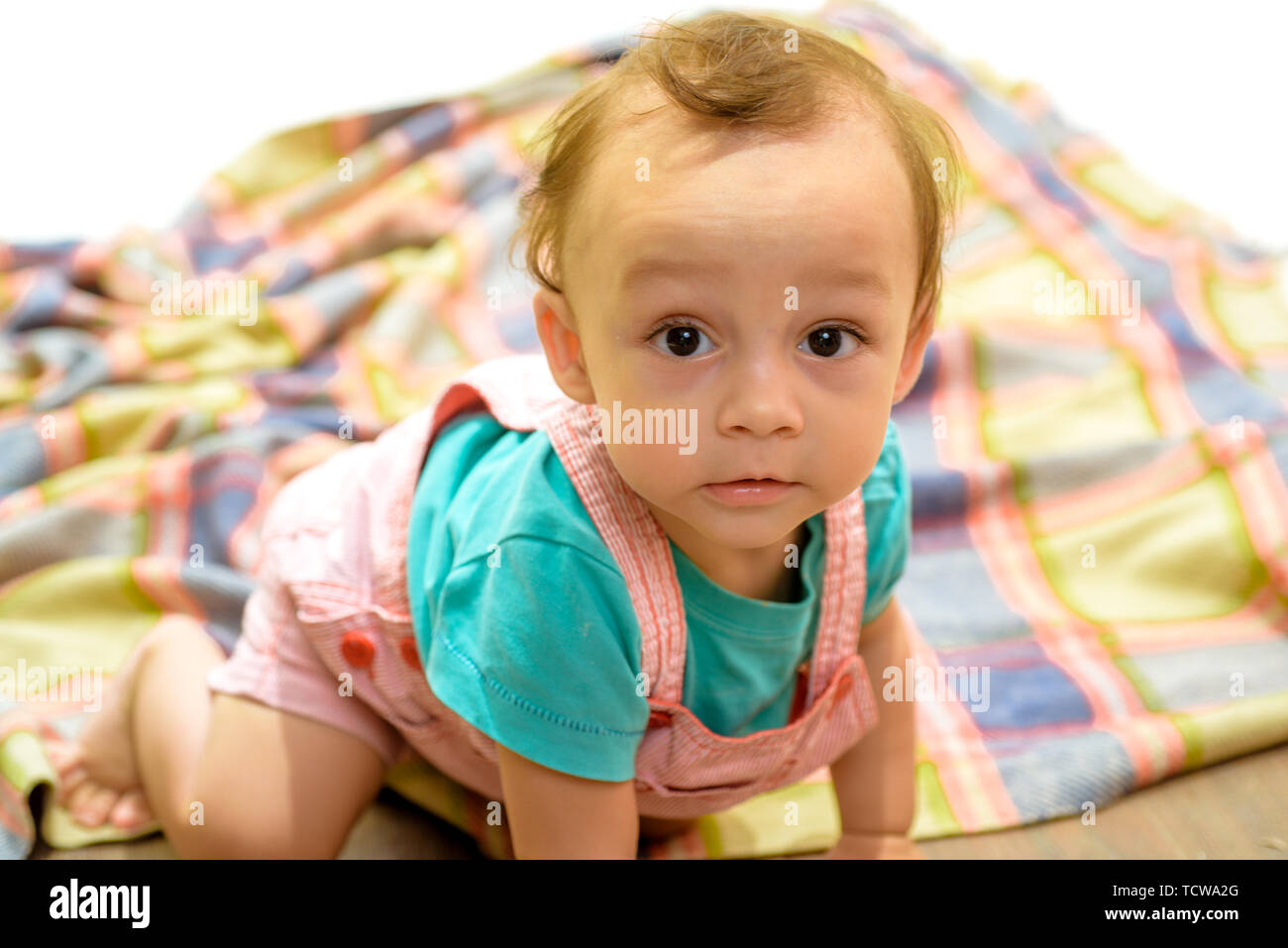 Making his way. Little boy child. Cute baby crawling on floor. Smiling ...