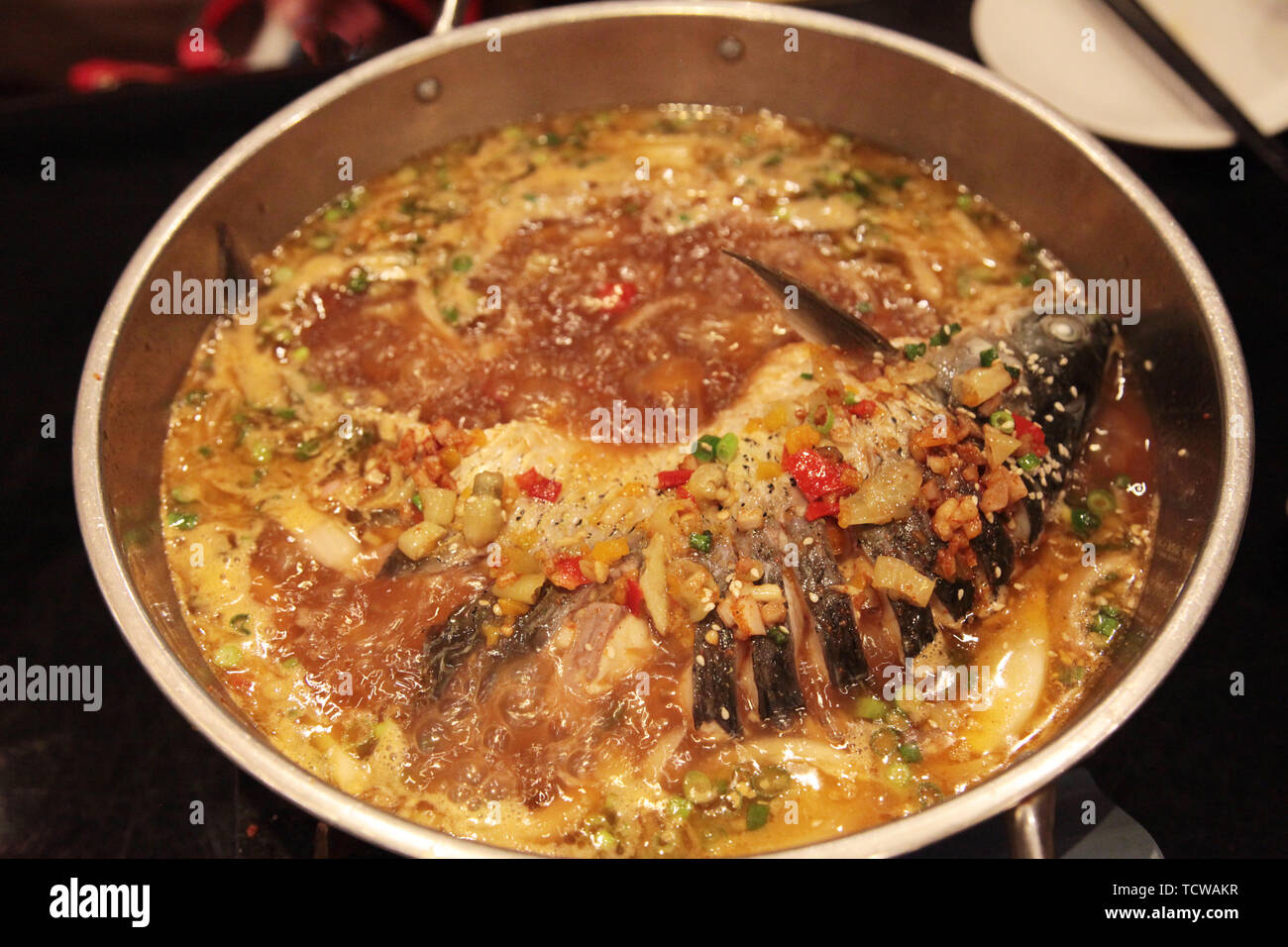 Diving fish, braised fish Stock Photo - Alamy