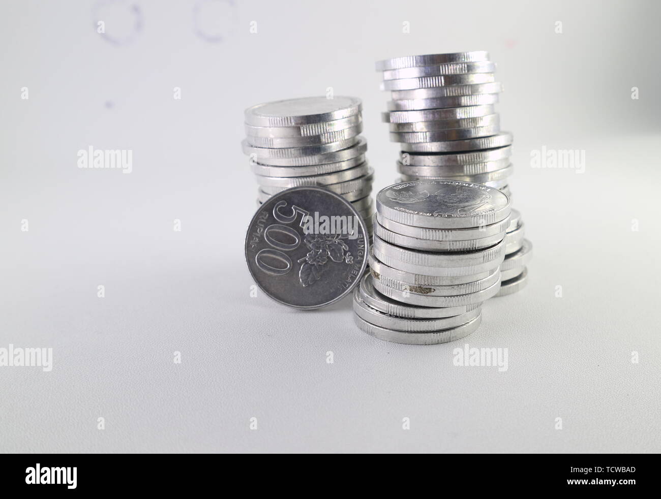 coin tower Isolated on white background Stock Photo - Alamy