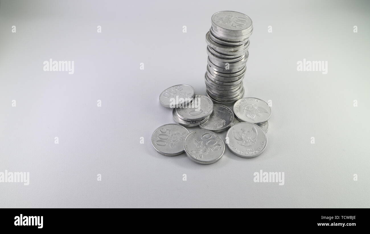 coin tower Isolated on white background Stock Photo - Alamy