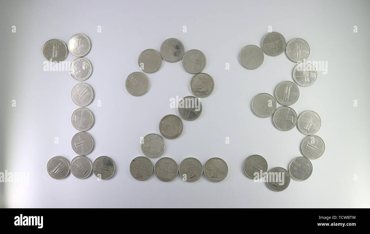 Coin Number Isolated on white background Stock Photo - Alamy