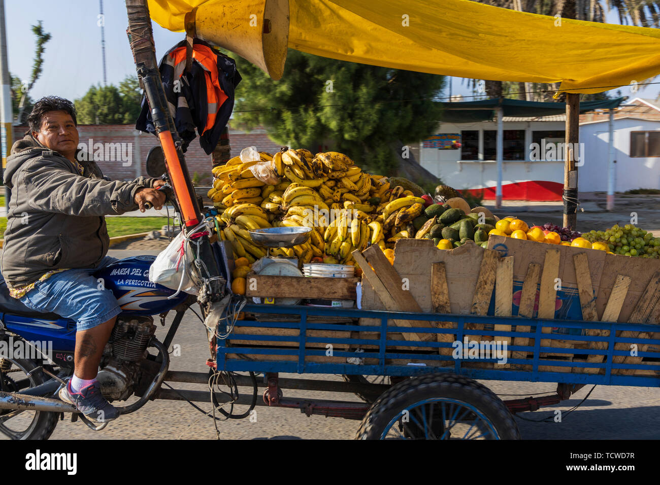 Fruit seller on his motorcycle powered cart in Paracas, Peru, South ...