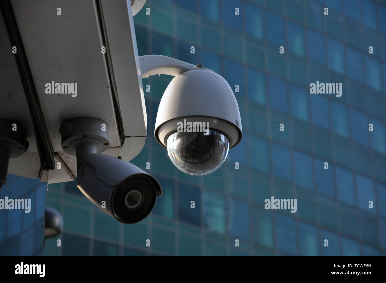 closed circuit camera Multi-angle CCTV system against the blue sky ...