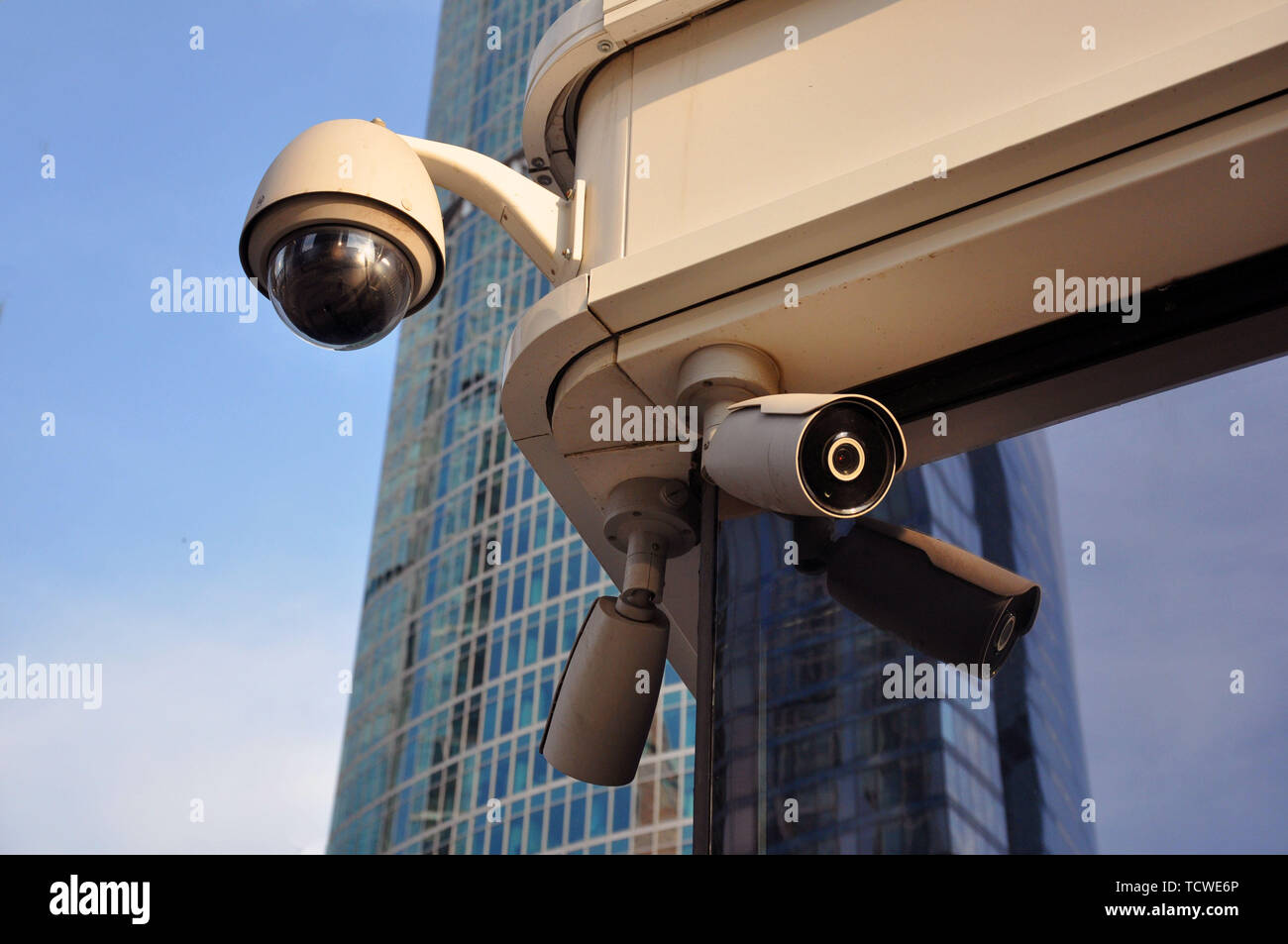closed circuit camera Multi-angle CCTV system against the blue sky ...