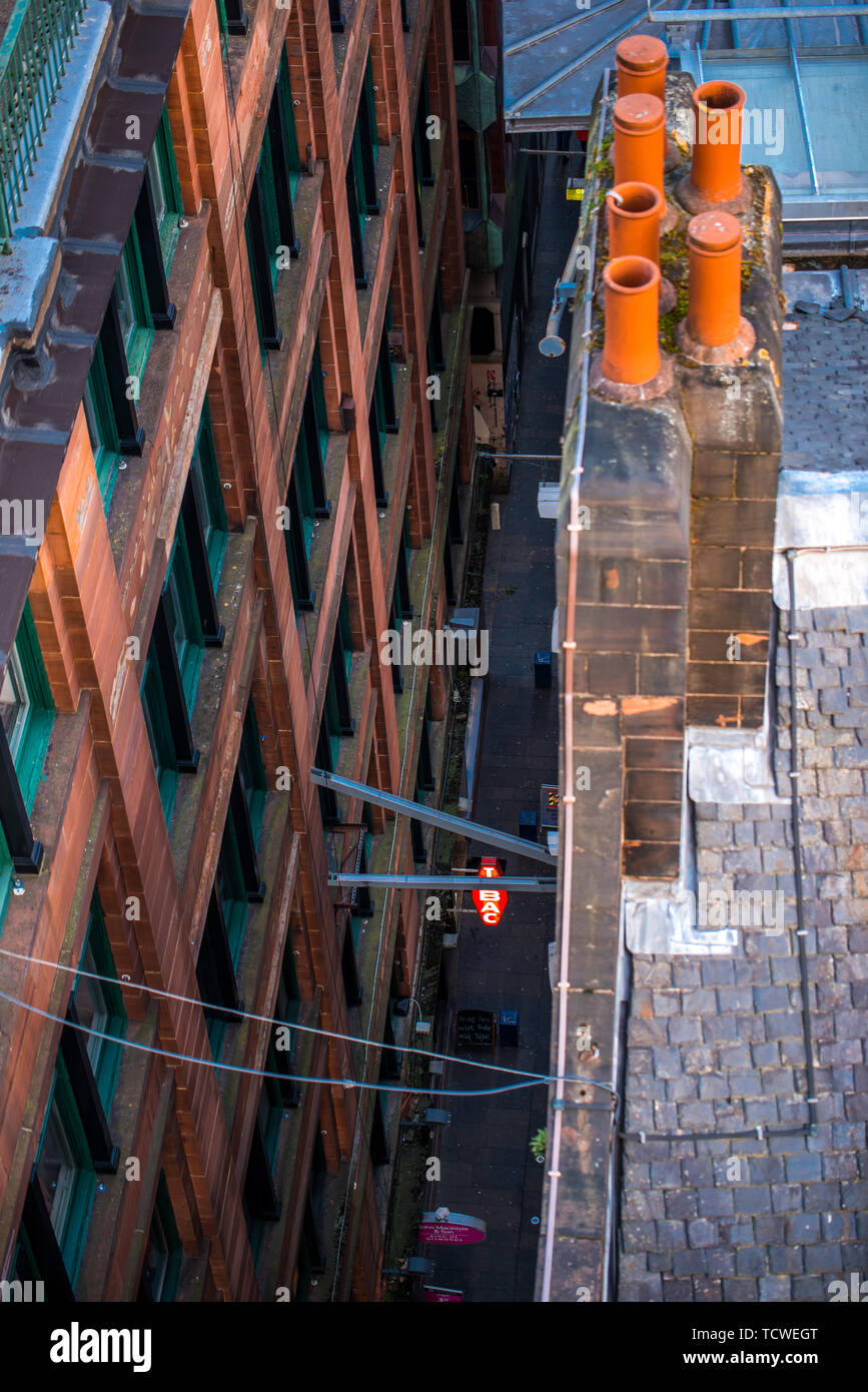 An abstract view looking down on a narrow alleyway in Glasgow city ...