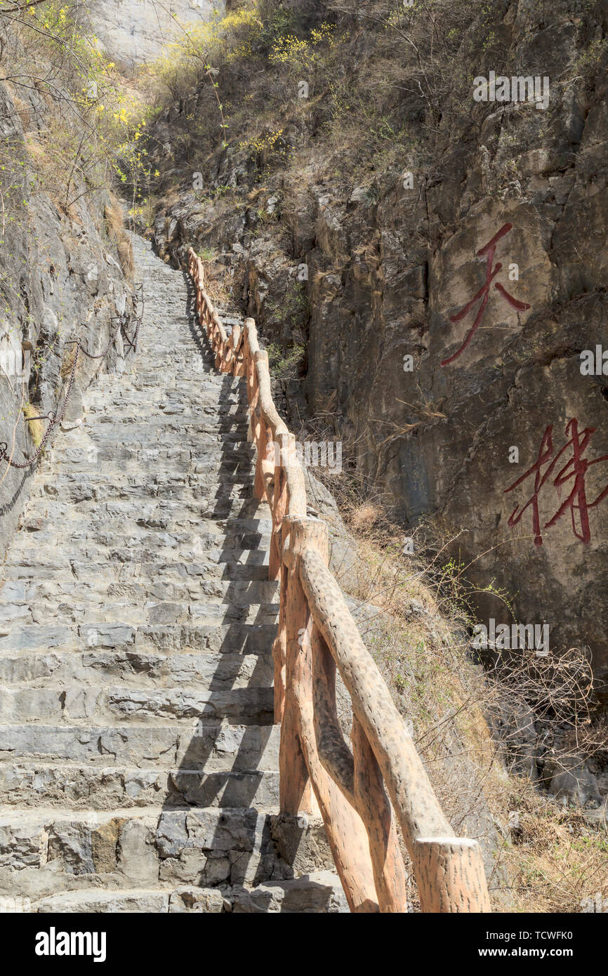 The steep stone ladder in the valley Stock Photo - Alamy