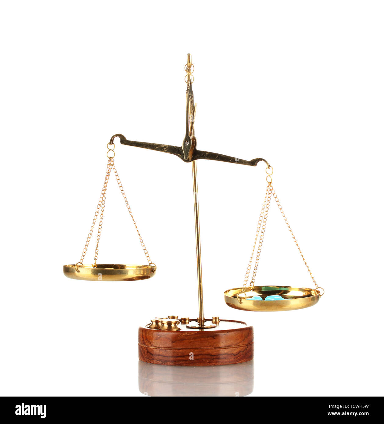 Classic scales with color pills isolated on white Stock Photo - Alamy