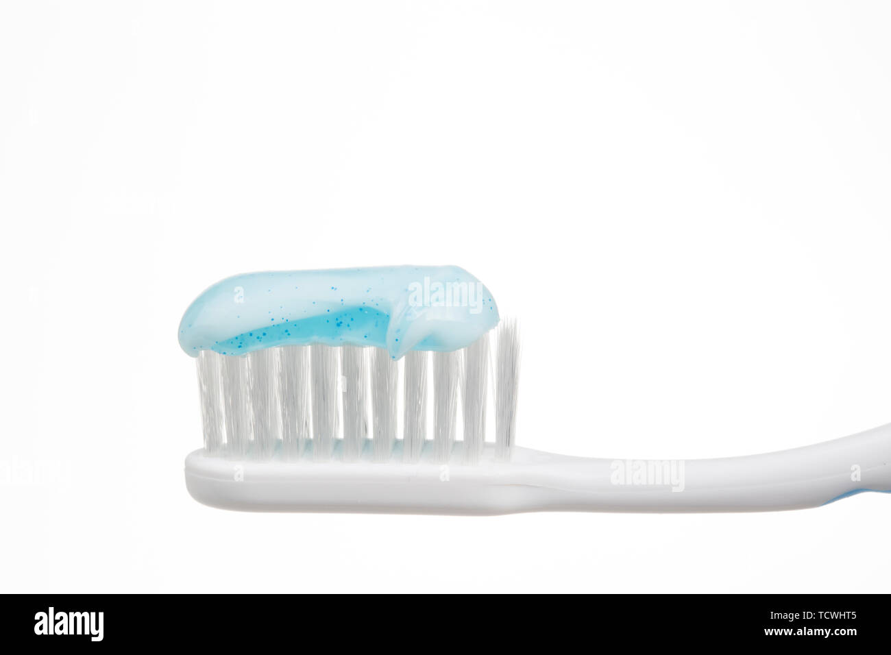 Toothbrush blue bristles toothpaste hi-res stock photography and images ...
