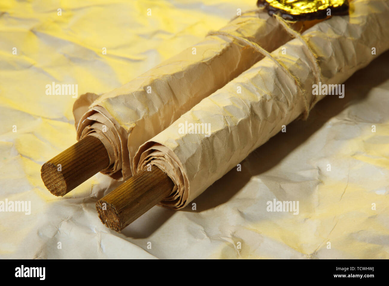 Old scroll, on brown paper background Stock Photo - Alamy