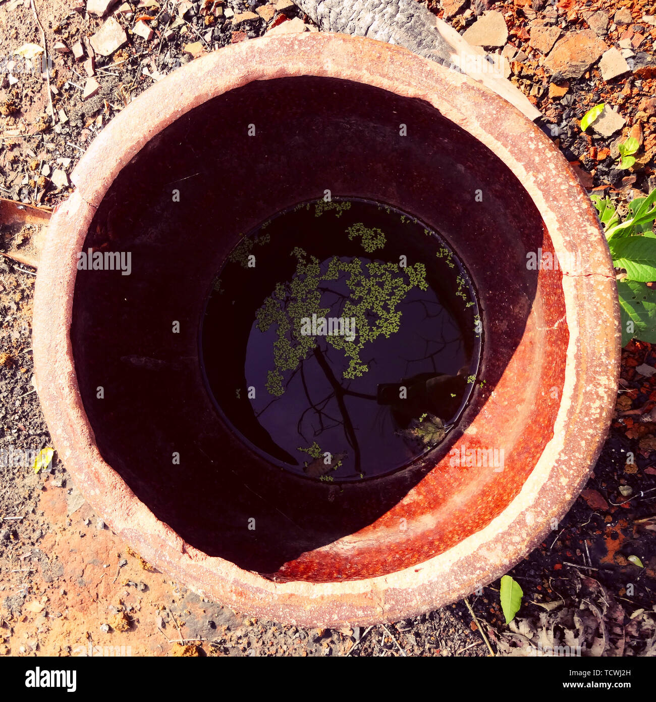 Discarded water tank Stock Photo - Alamy