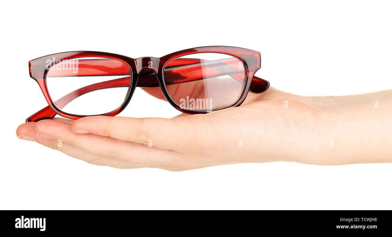Beautiful glasses on female hand isolated on white Stock Photo - Alamy
