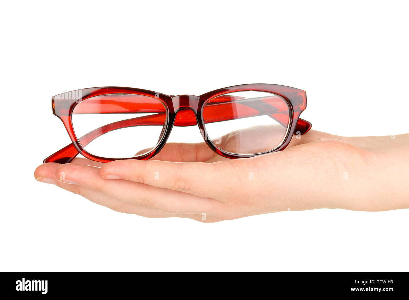 Beautiful glasses on female hand isolated on white Stock Photo - Alamy