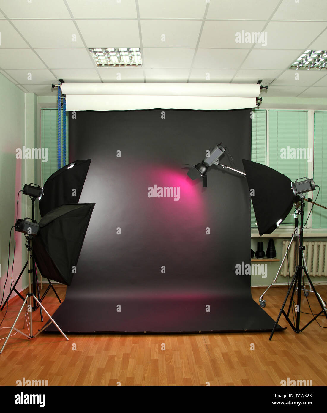 Empty photo studio with lighting equipment Stock Photo - Alamy