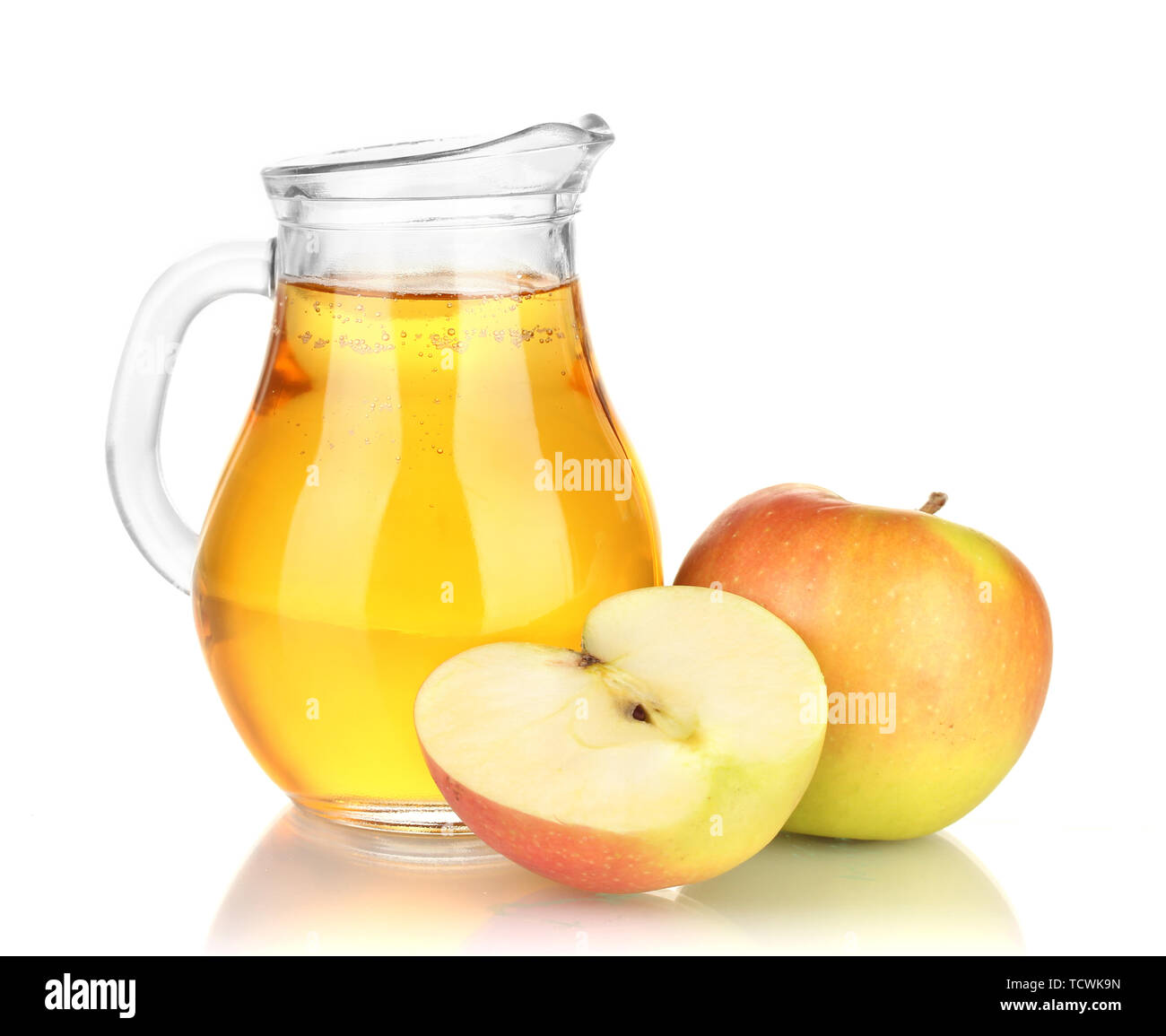 Full jug of apple juice and apple isolated on white Stock Photo - Alamy