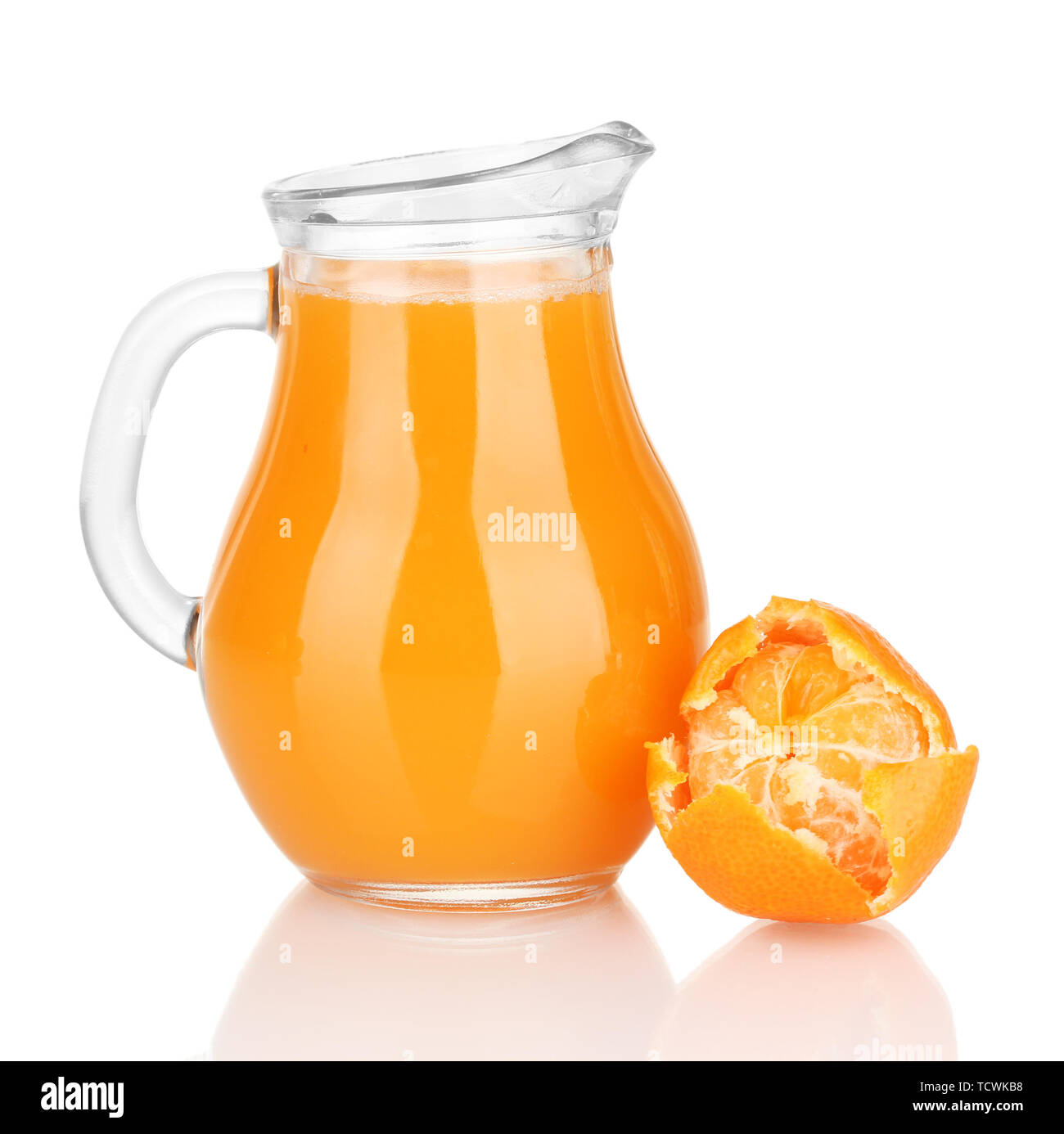 Full jug of tangerine juice, isolated on white Stock Photo - Alamy