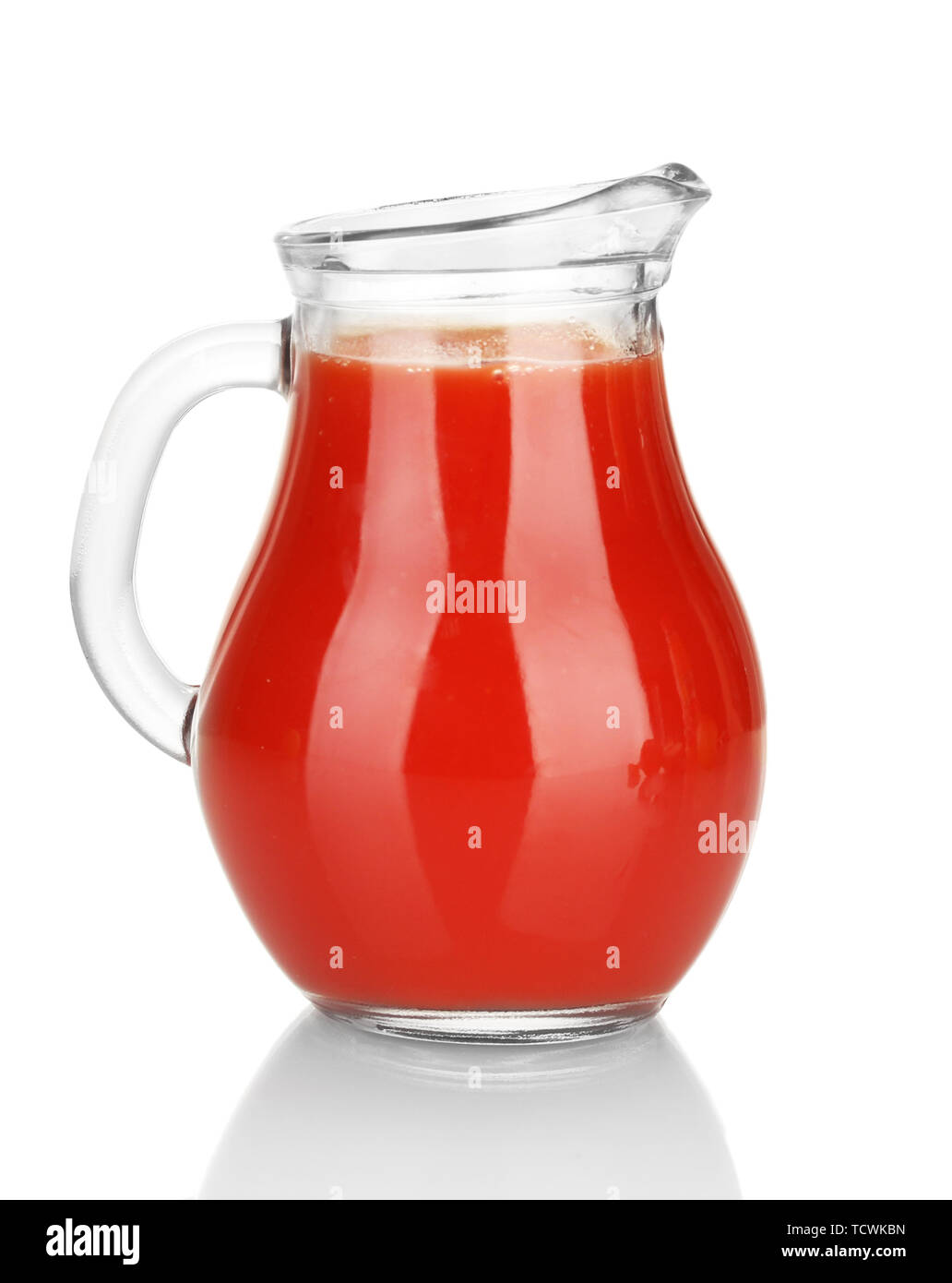 Full jug of tomato juice, isolated on white Stock Photo - Alamy