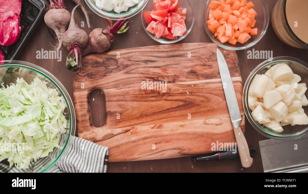 Step by step. Flat lay. Slicing beetroot into the small cubes for beet ...
