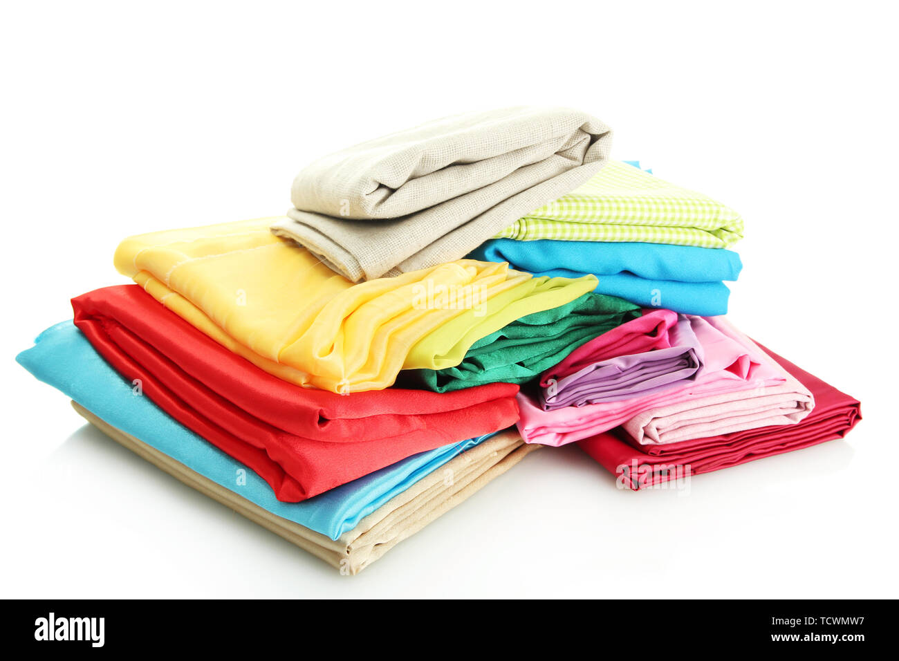 heap of cloth fabrics isolated on white Stock Photo - Alamy