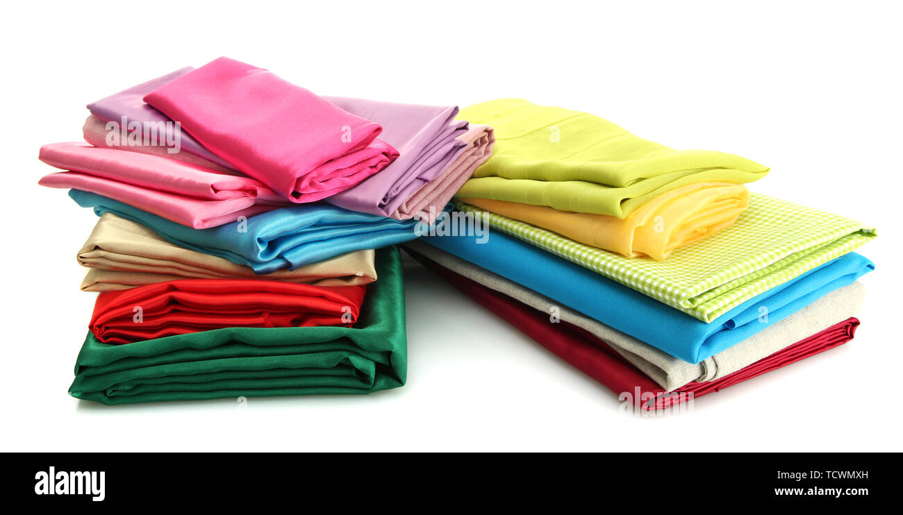heap of cloth fabrics isolated on white Stock Photo - Alamy