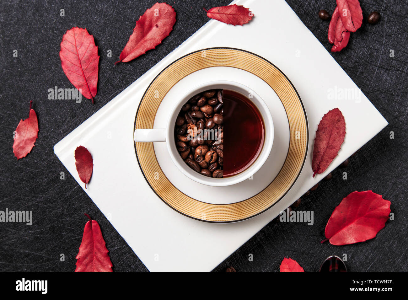 Intense coffee and coffee beans Stock Photo - Alamy
