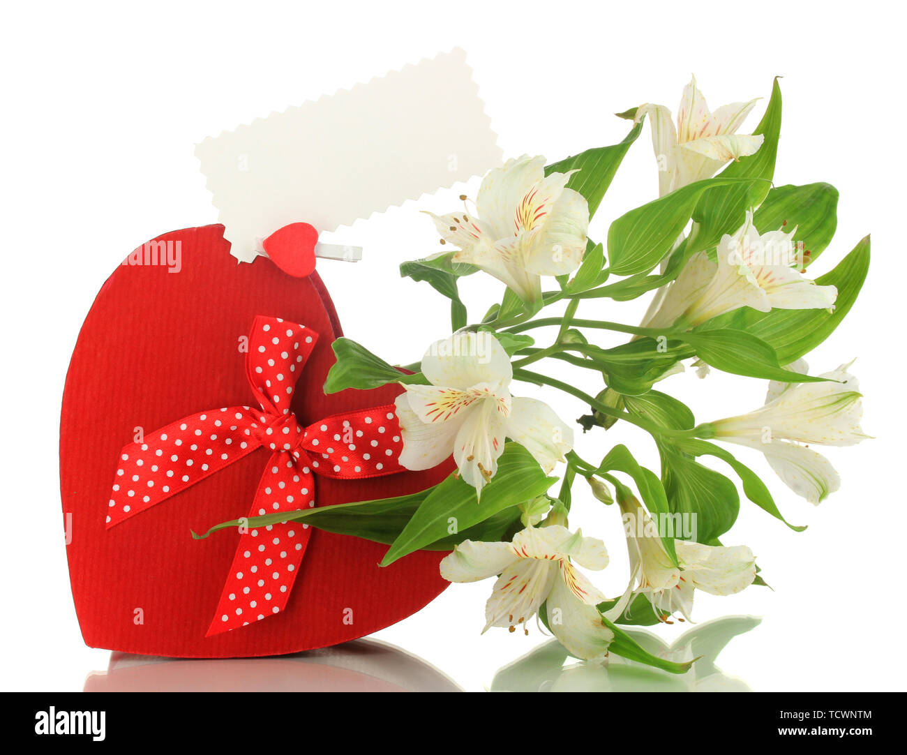 Giftbox and flowers isolated on white Stock Photo - Alamy