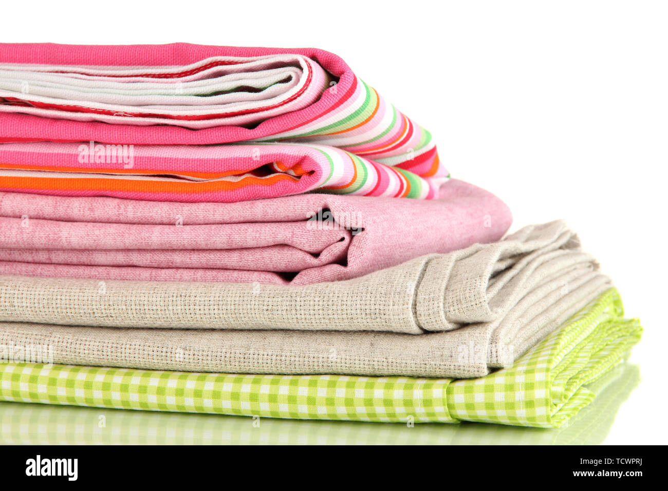 Pile of different fabrics isolated on white Stock Photo - Alamy