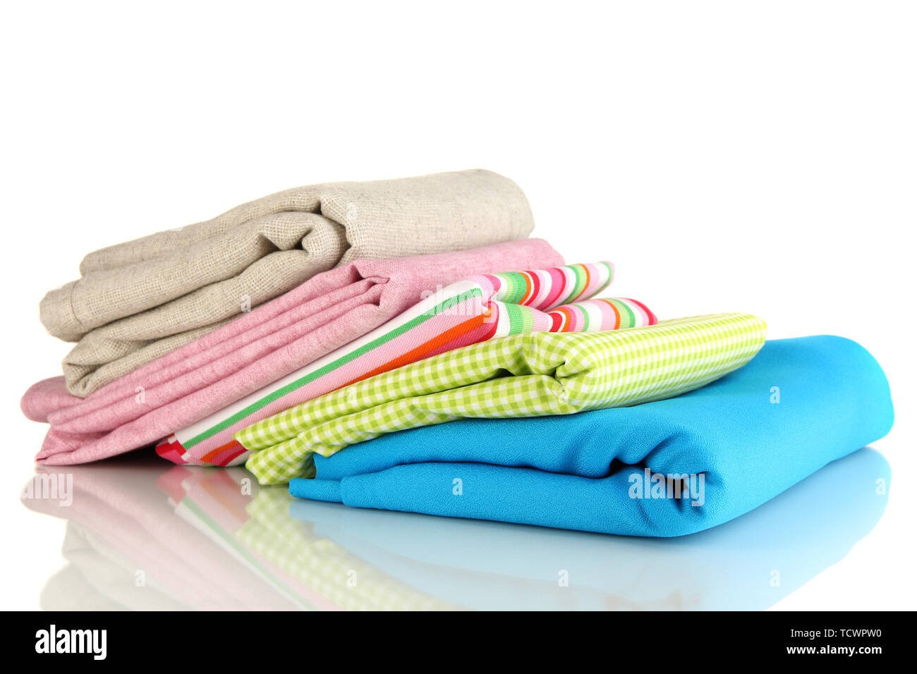 Pile of different fabrics isolated on white Stock Photo - Alamy