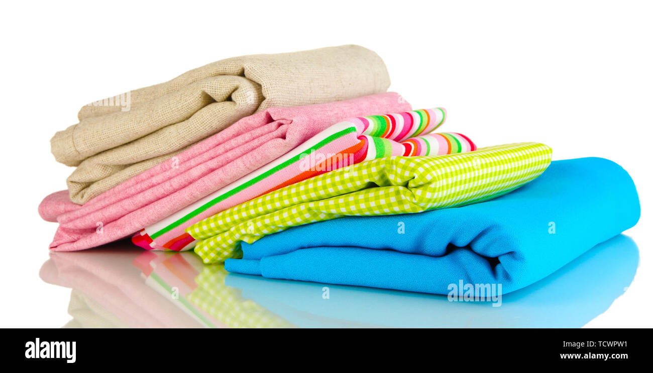 Pile of different fabrics isolated on white Stock Photo - Alamy