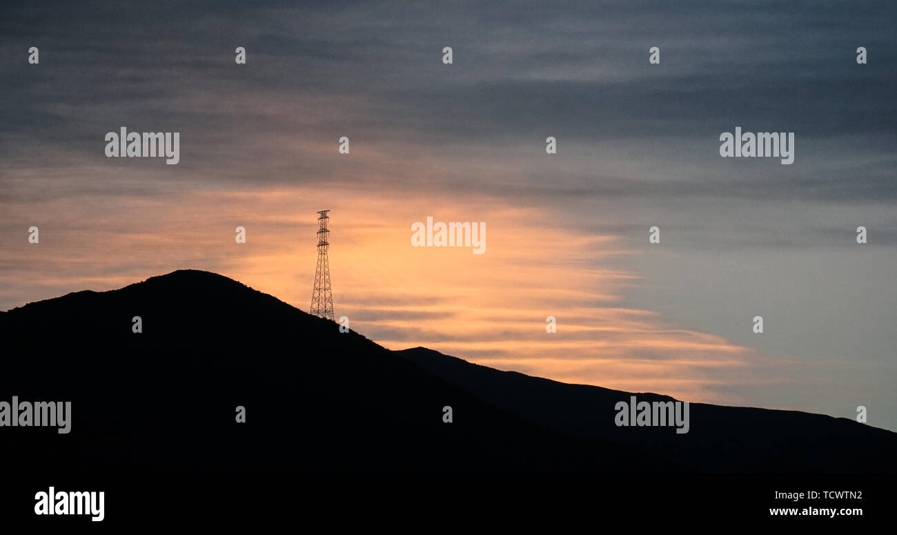 Dusk mountain shadow Stock Photo - Alamy