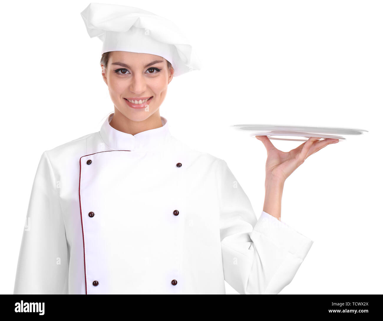 Portrait of young woman chef with tray isolated on white Stock Photo ...