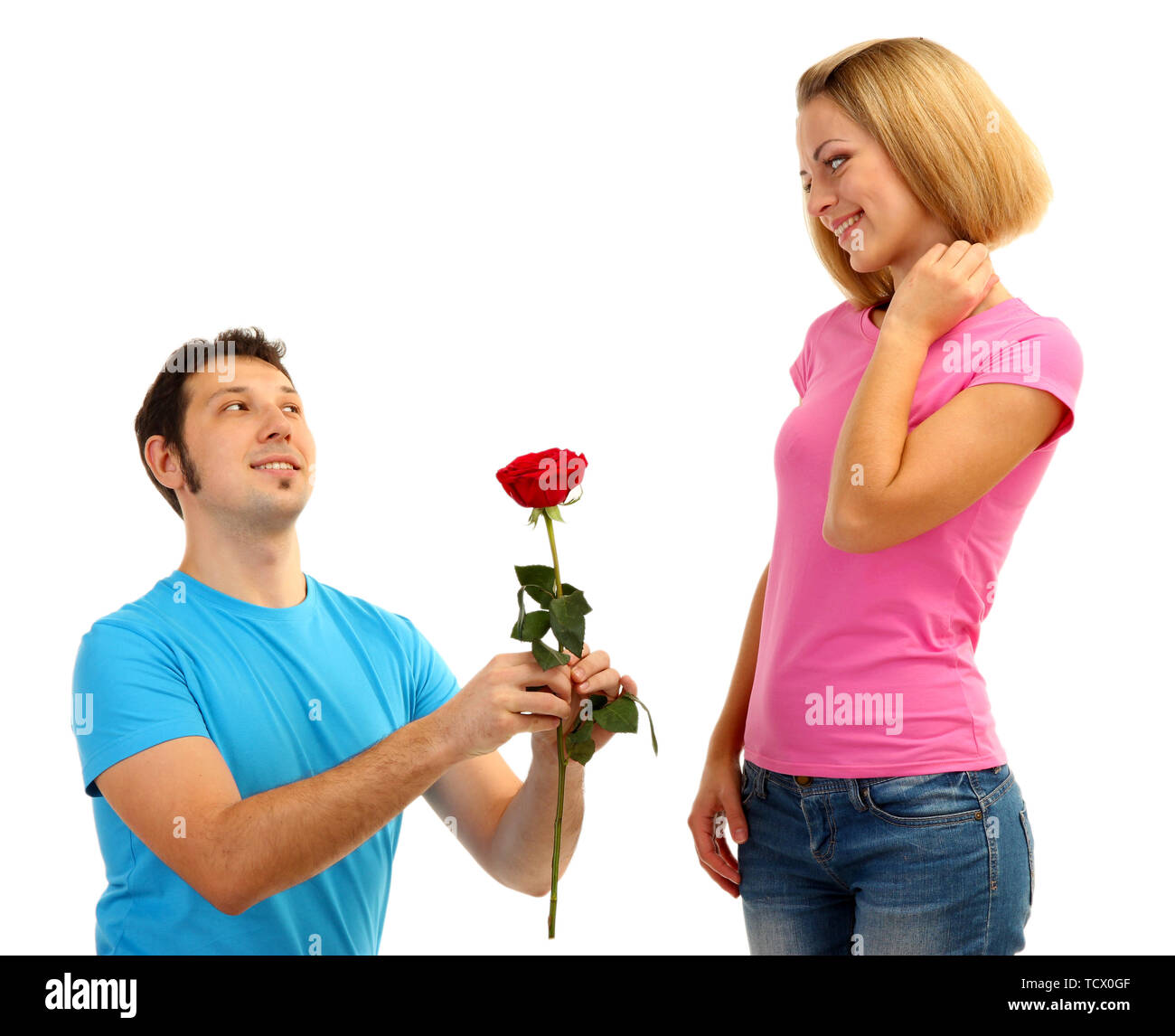 Loving man giving woman rose isolated on white Stock Photo - Alamy