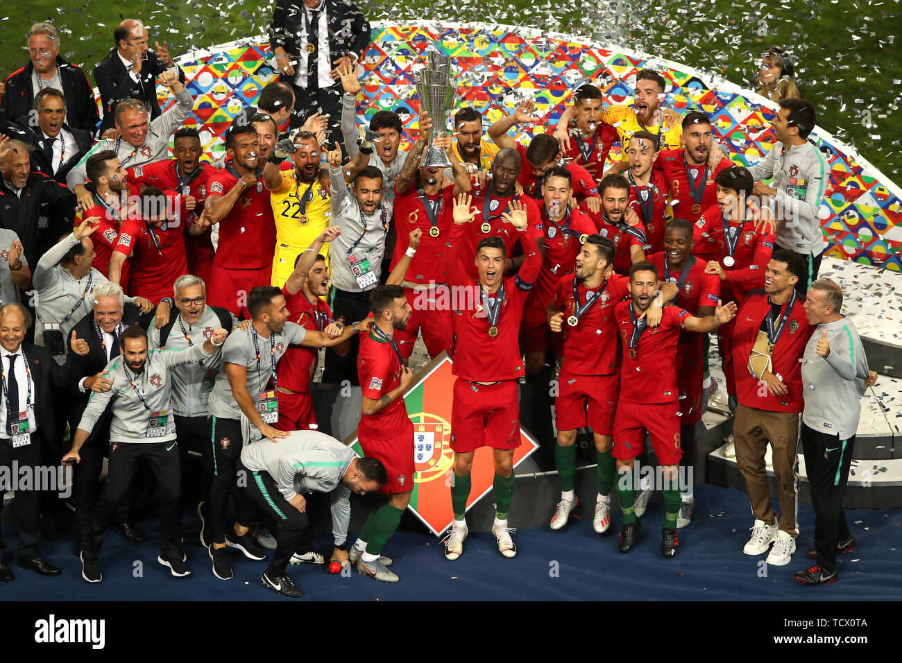 Portugal's Jose Fonte (centre) lifts the Nations League Trophy with ...