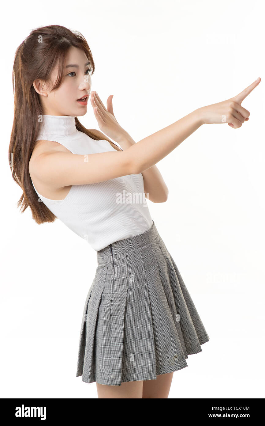 Beautiful cute college student against white background Stock Photo - Alamy