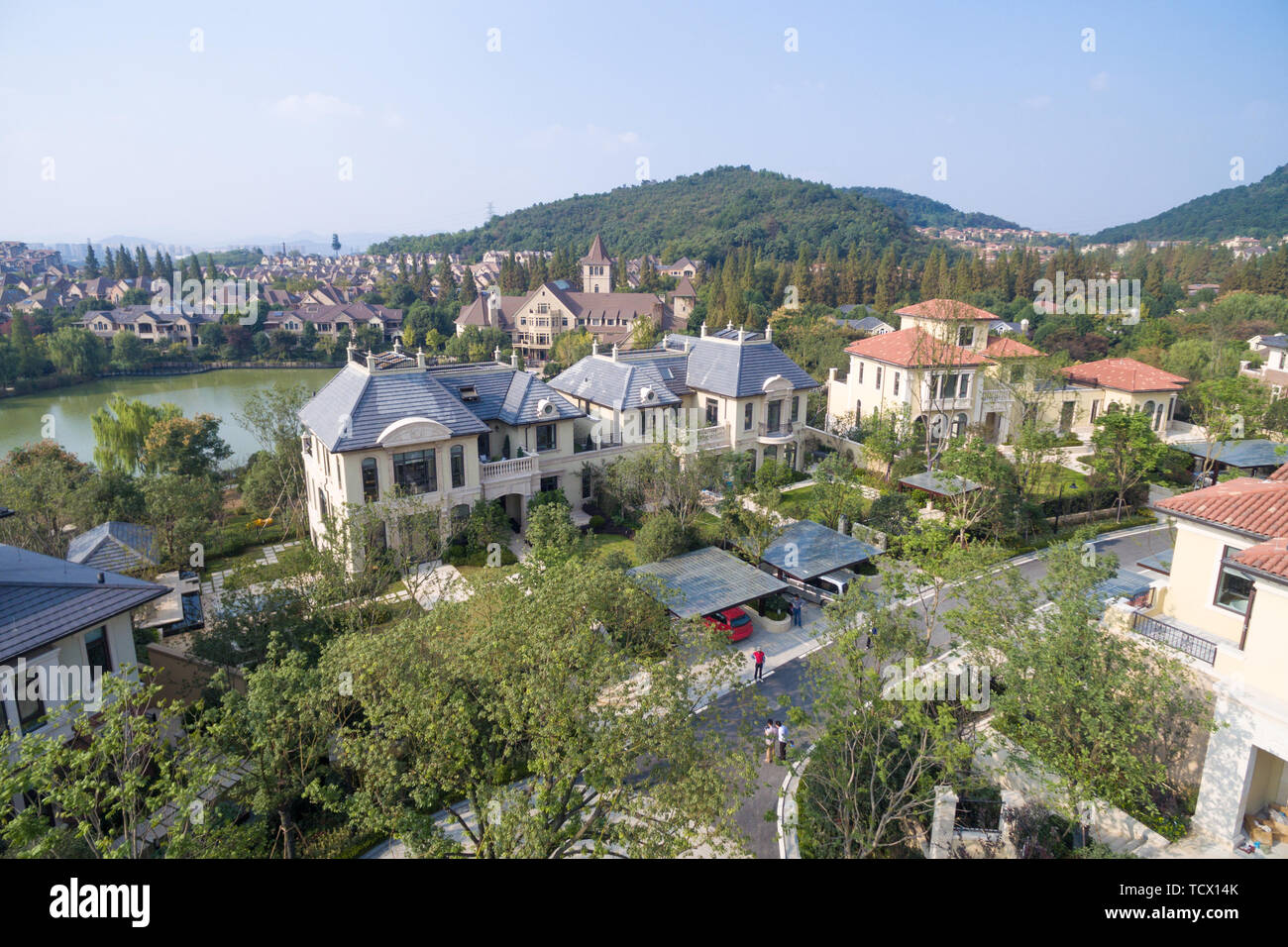 aerial view of modern villas at the foot of hill Stock Photo - Alamy