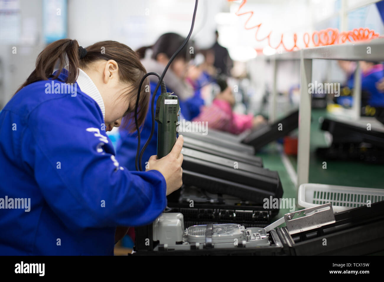 Asian factory worker production line hi-res stock photography and ...