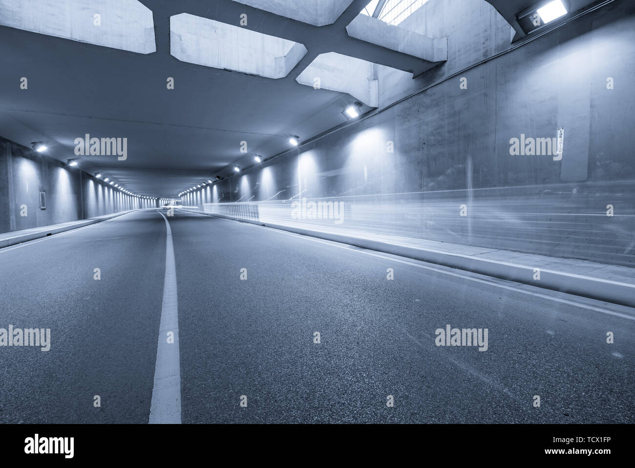 Light perspective view of cars and urban tunnel hi-res stock ...