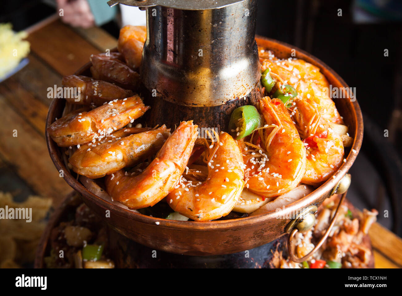 Charcoal grilled prawn pot combination Stock Photo - Alamy