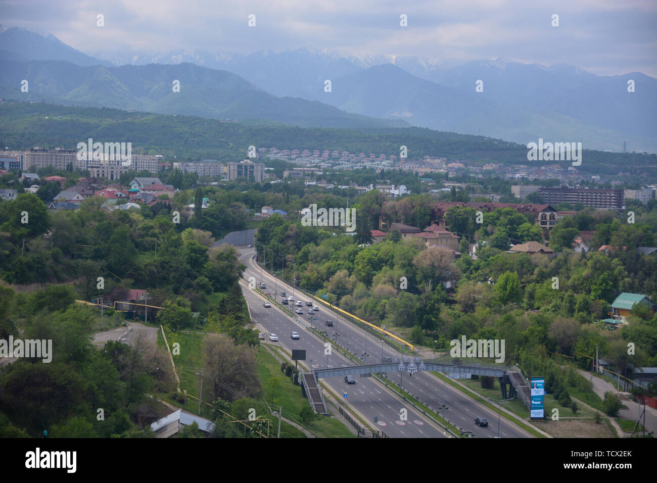 Panoramic view of the city of Almaty, with road, industrial zone ...